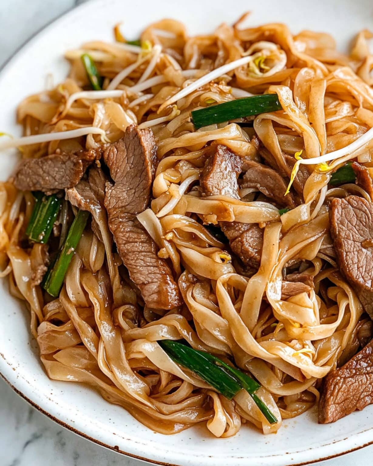 Beef Chow Fun Recipe - YummyHere