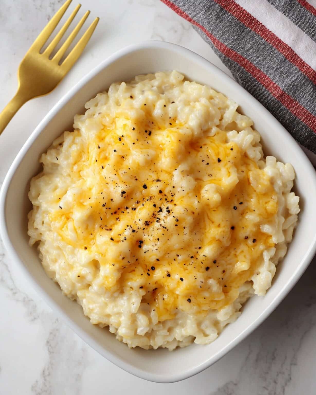 Cheesy Rice Recipe - YummyHere