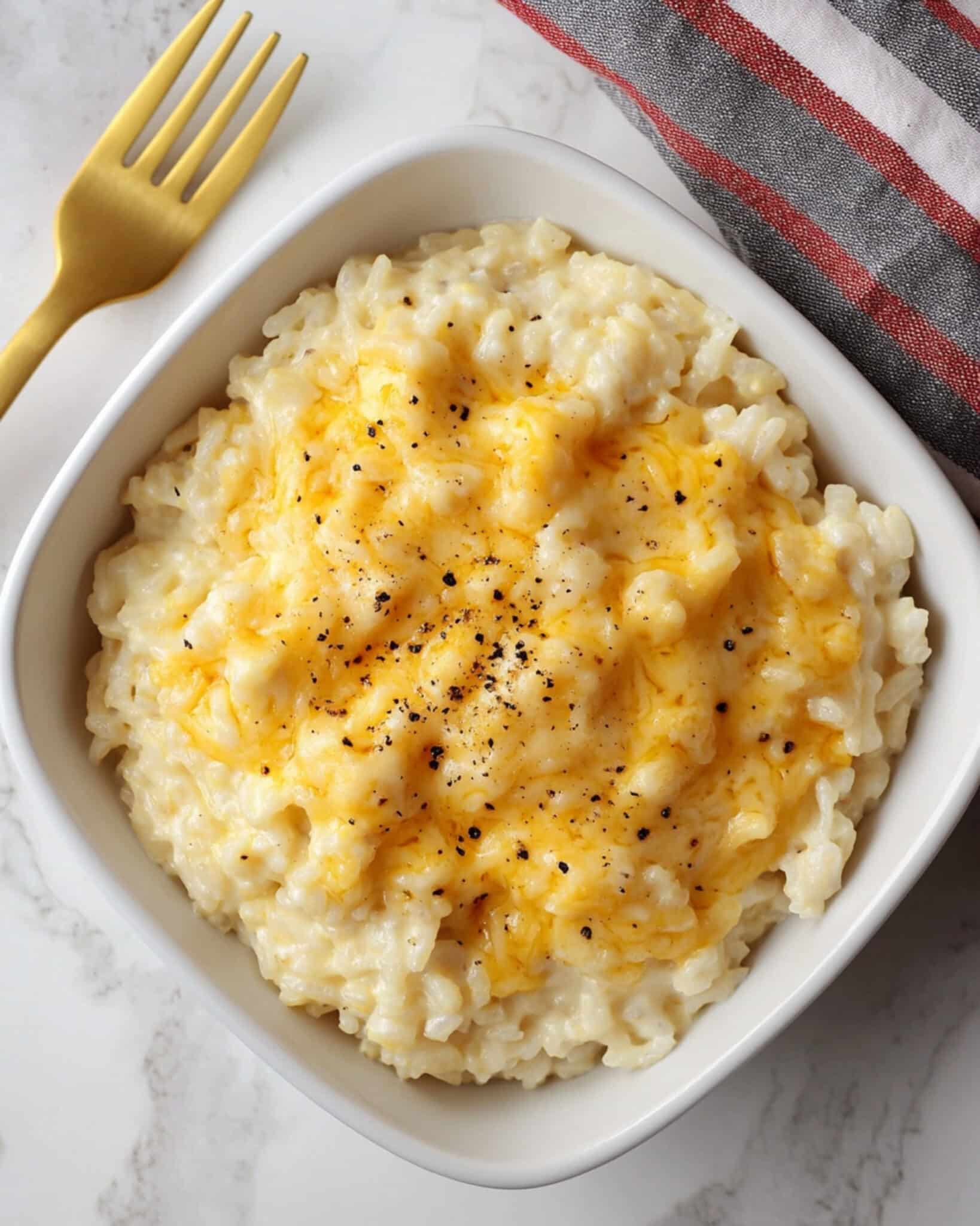 Cheesy Rice Recipe - YummyHere