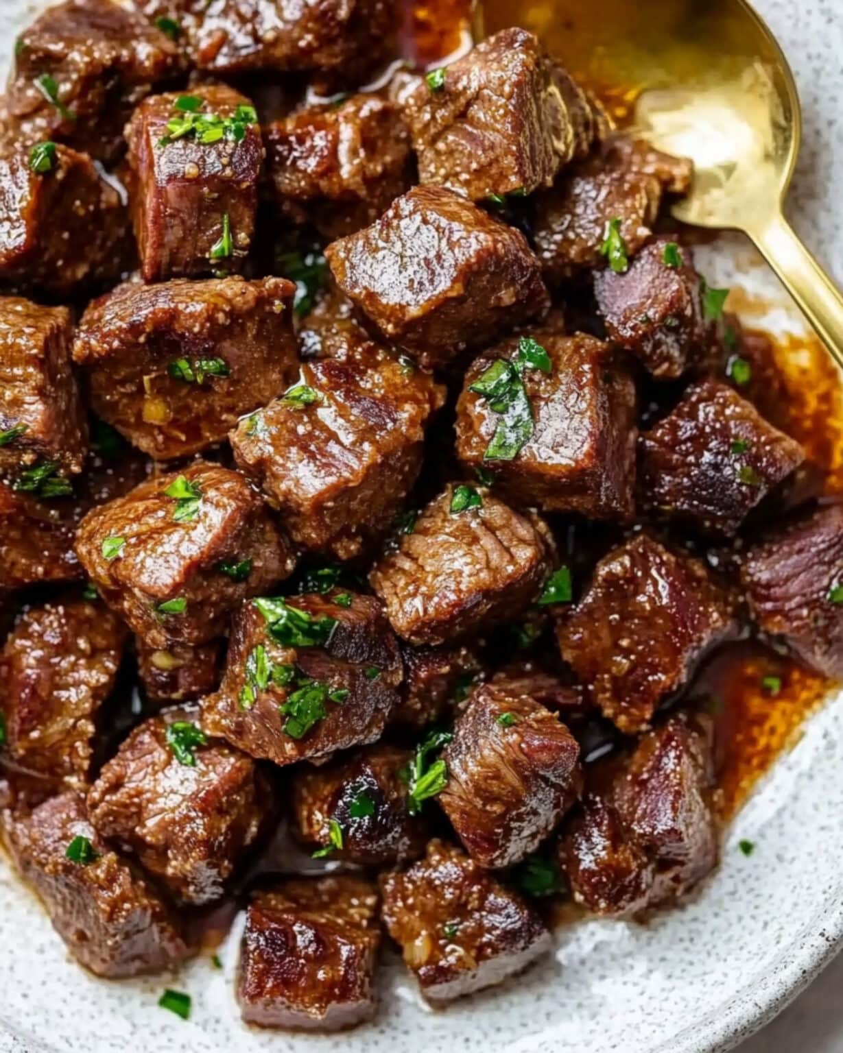 Garlic Butter Steak Bites Recipe - YummyHere