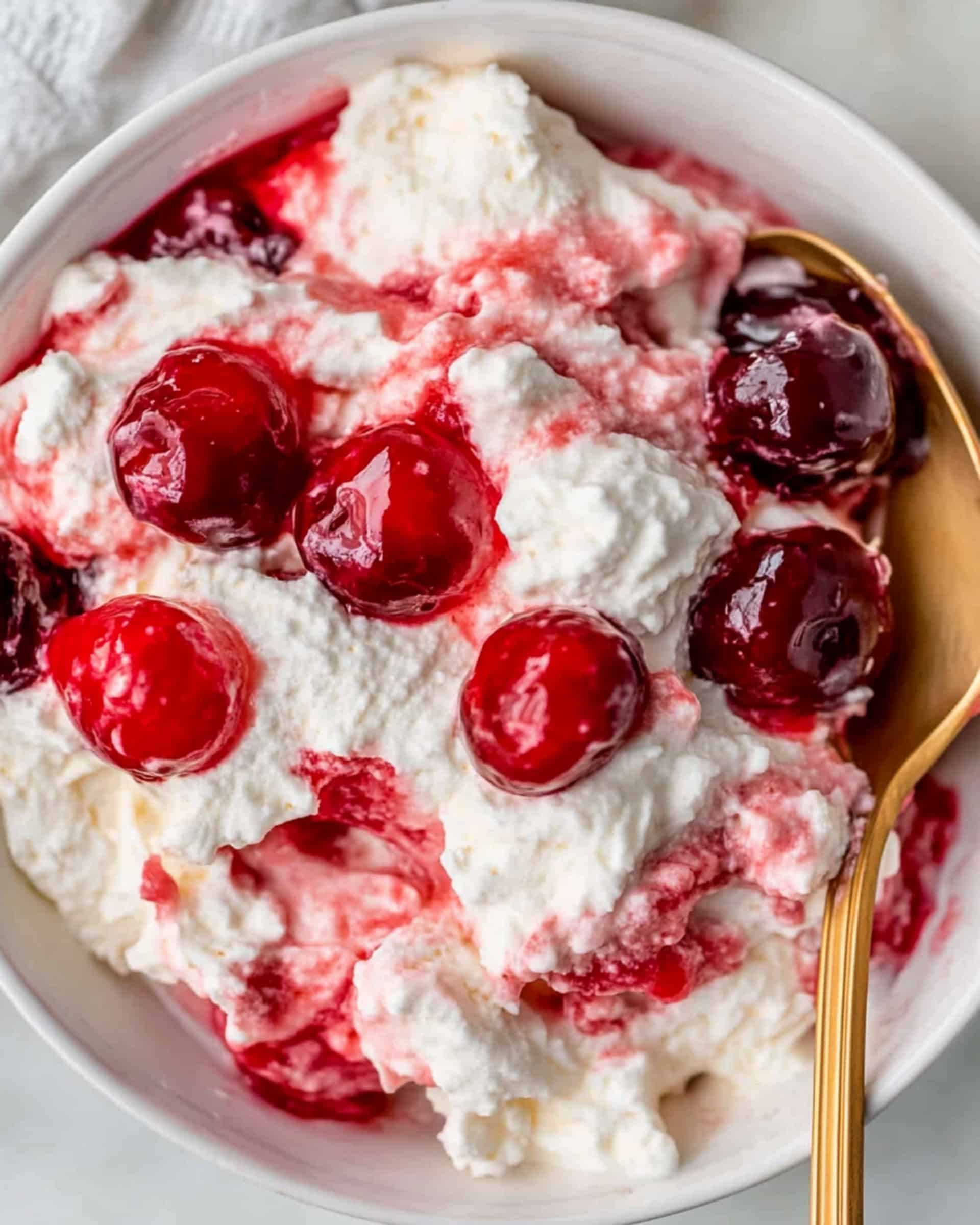 Cherries in the Snow Dessert Recipe - YummyHere