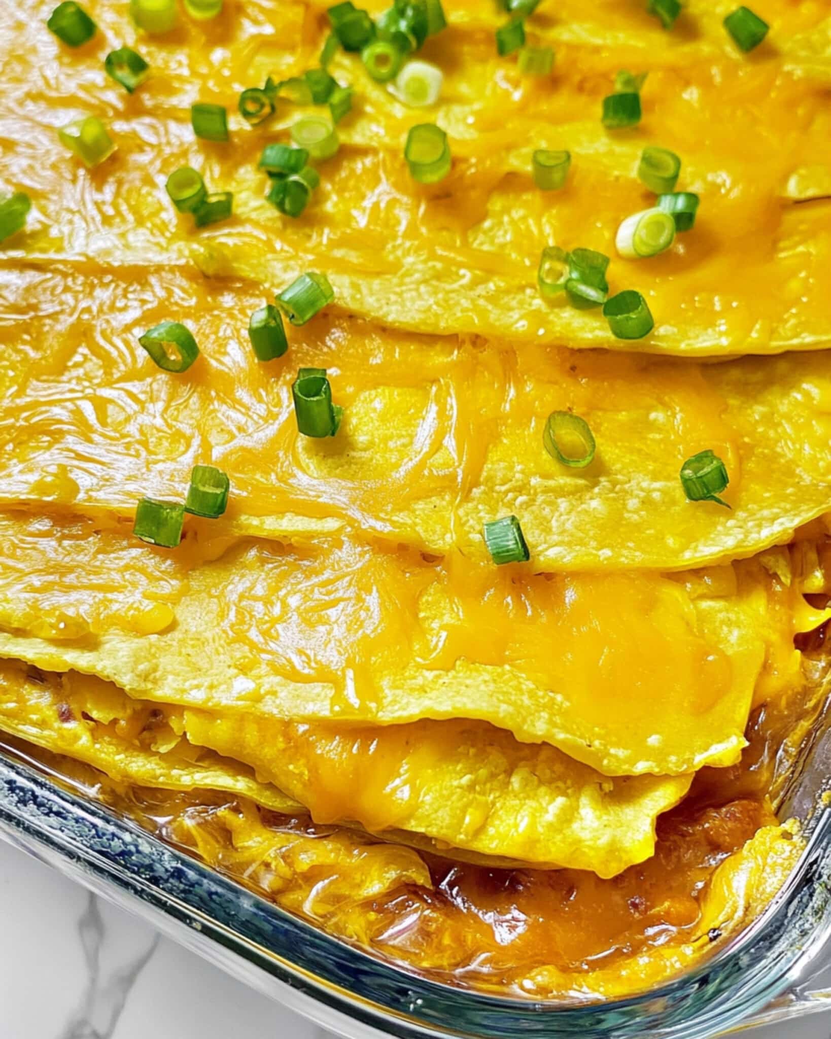 Shredded Chicken Enchilada Casserole Recipe - YummyHere
