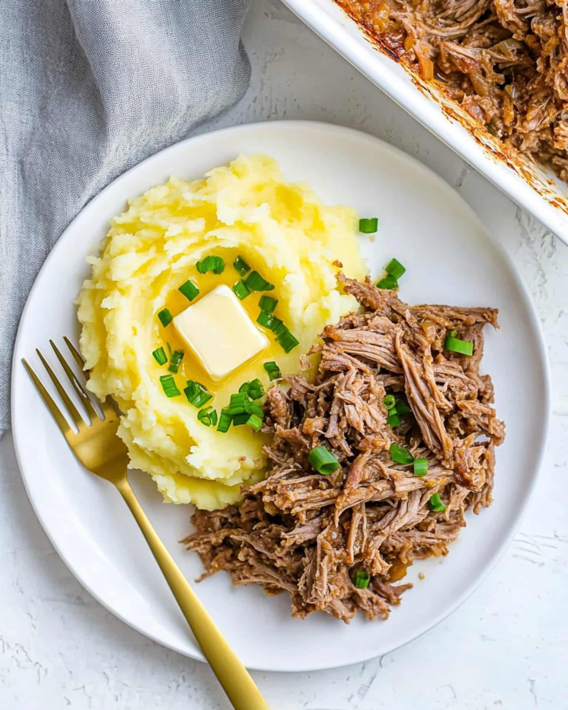 Slow Cooker Shredded Beef Recipe - YummyHere